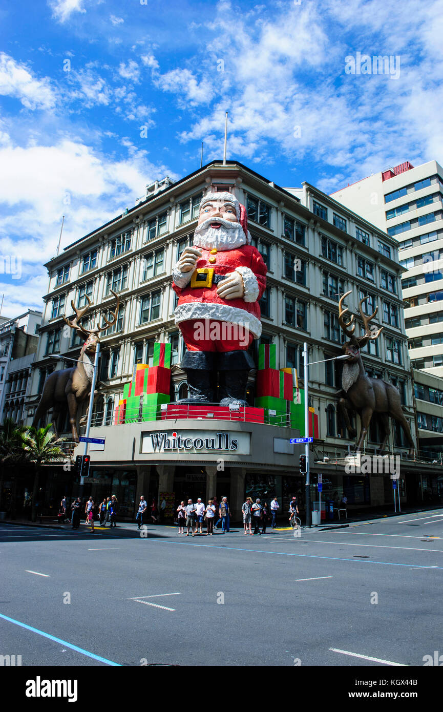 Giant Santa Claus on a shop in downtown Auckland, New Zealand Stock ...