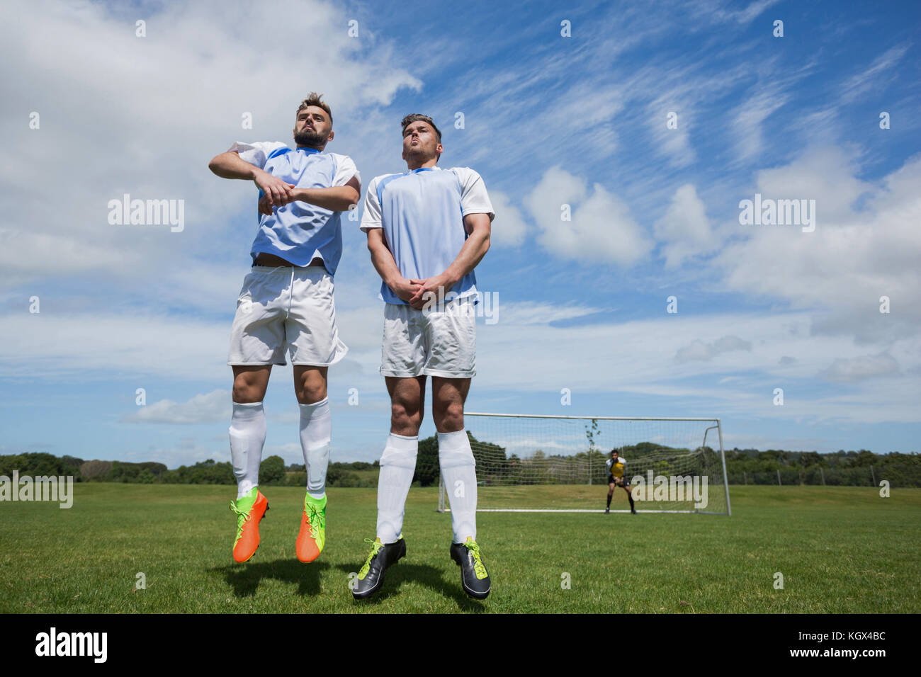 Action jumping of ground football hi-res stock photography and images ...