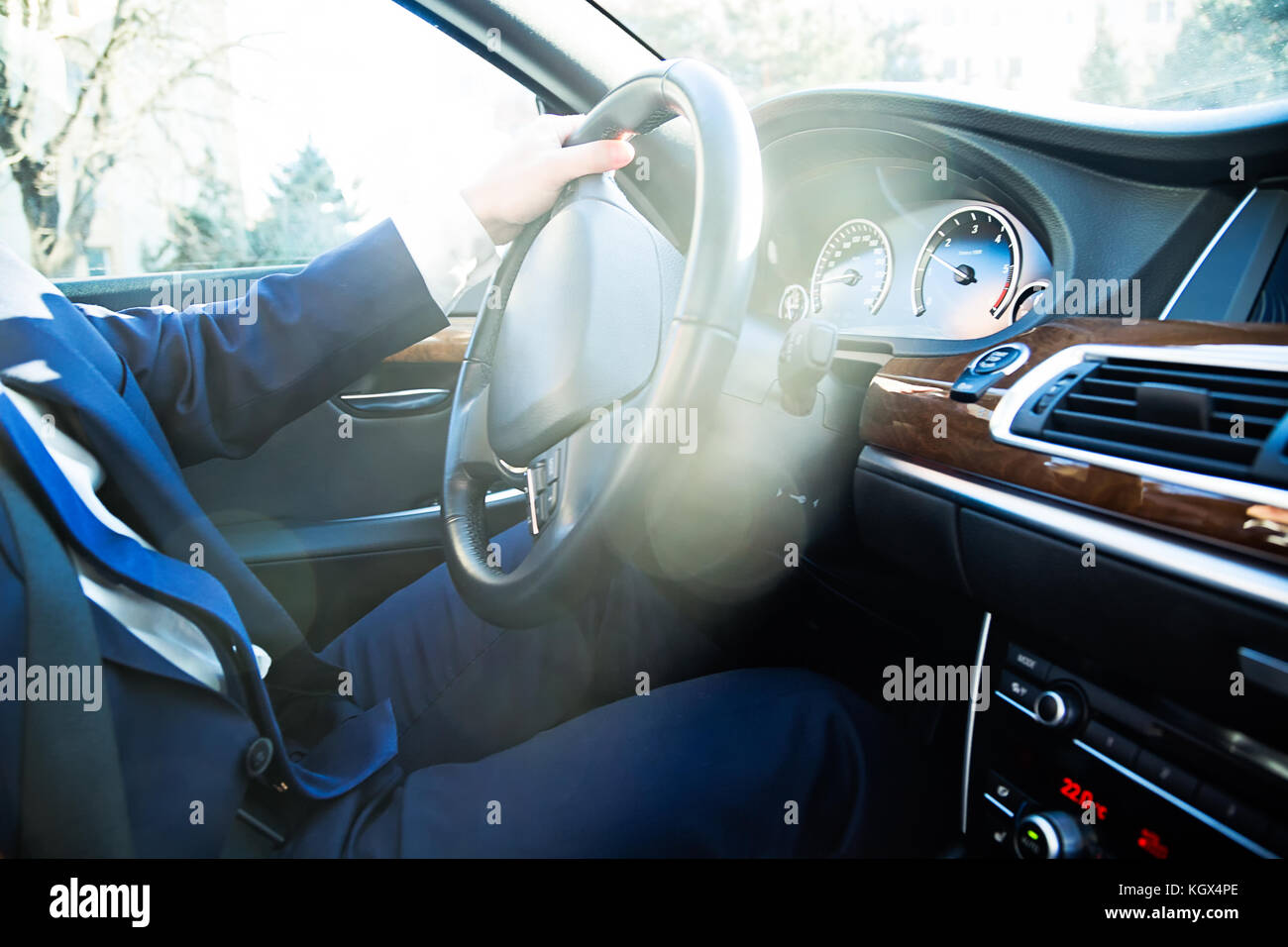 Hand man sitting behind wheel hi-res stock photography and images - Alamy