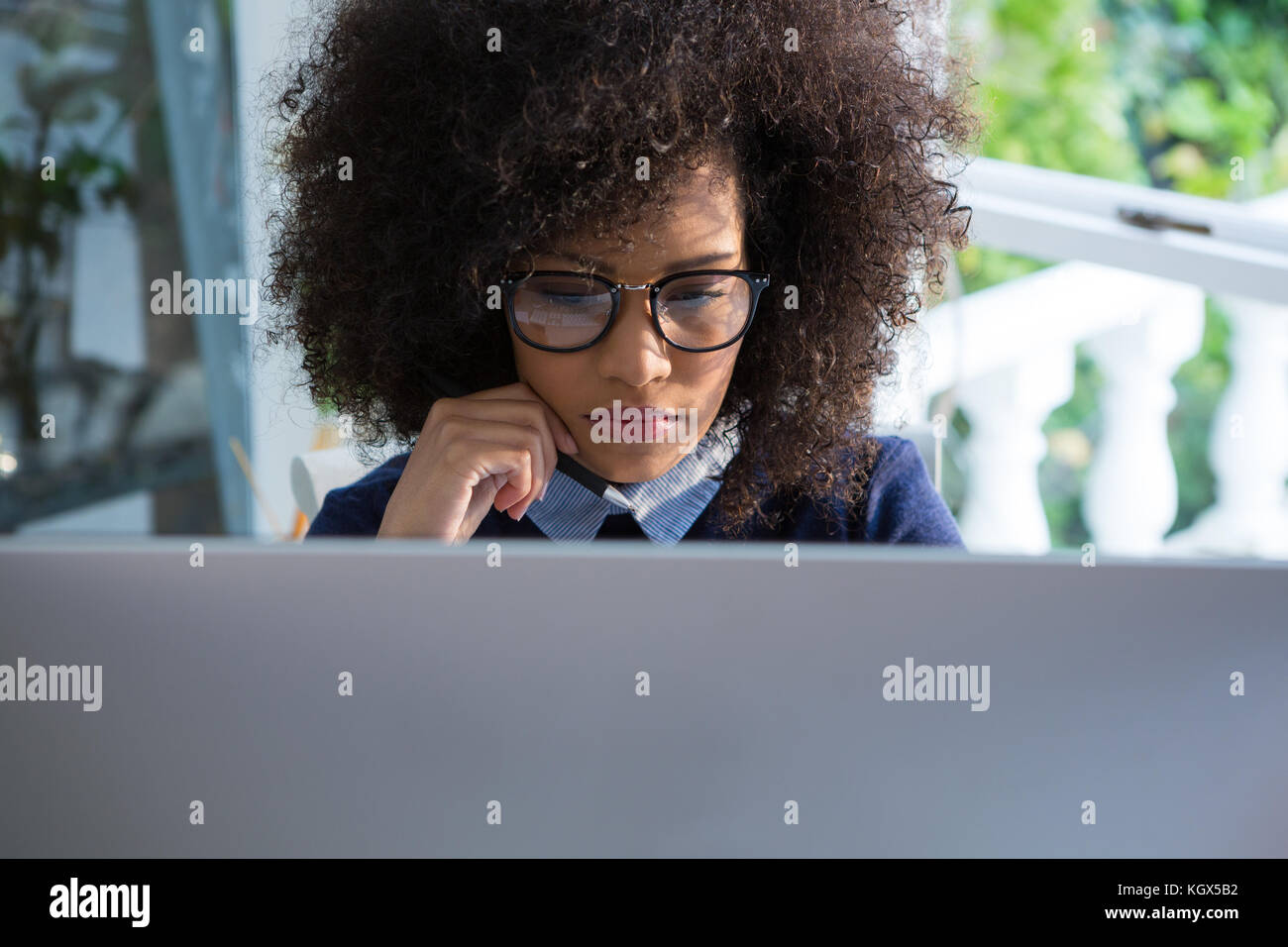 Beautiful woman working on desktop pc at home Stock Photo - Alamy