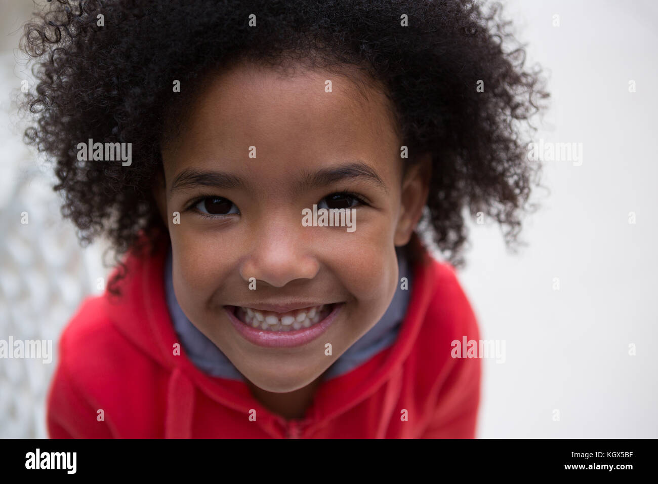 Portrait of girl smiling at home Stock Photo - Alamy