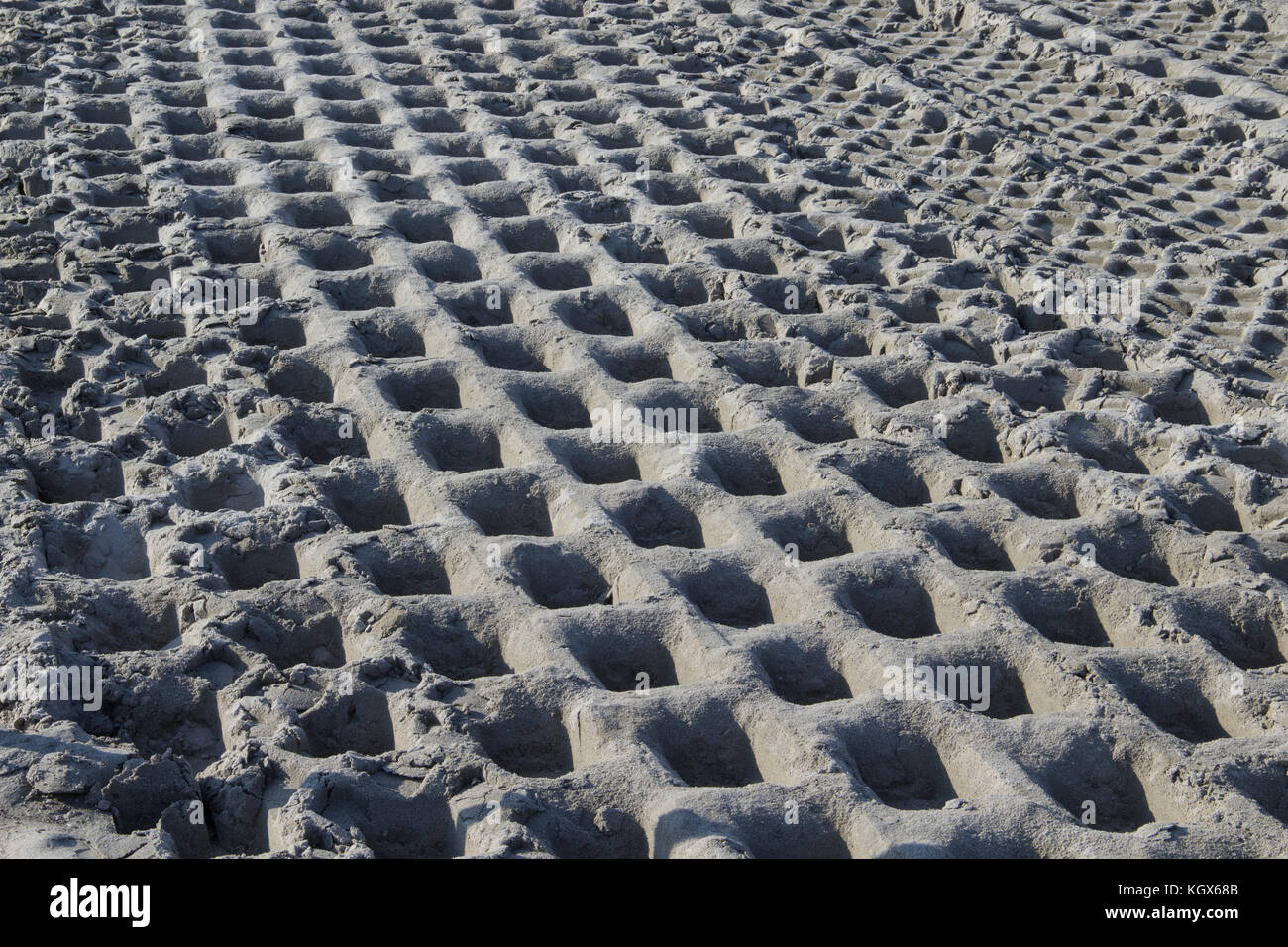 tamped sand on the pad for future construction Stock Photo - Alamy