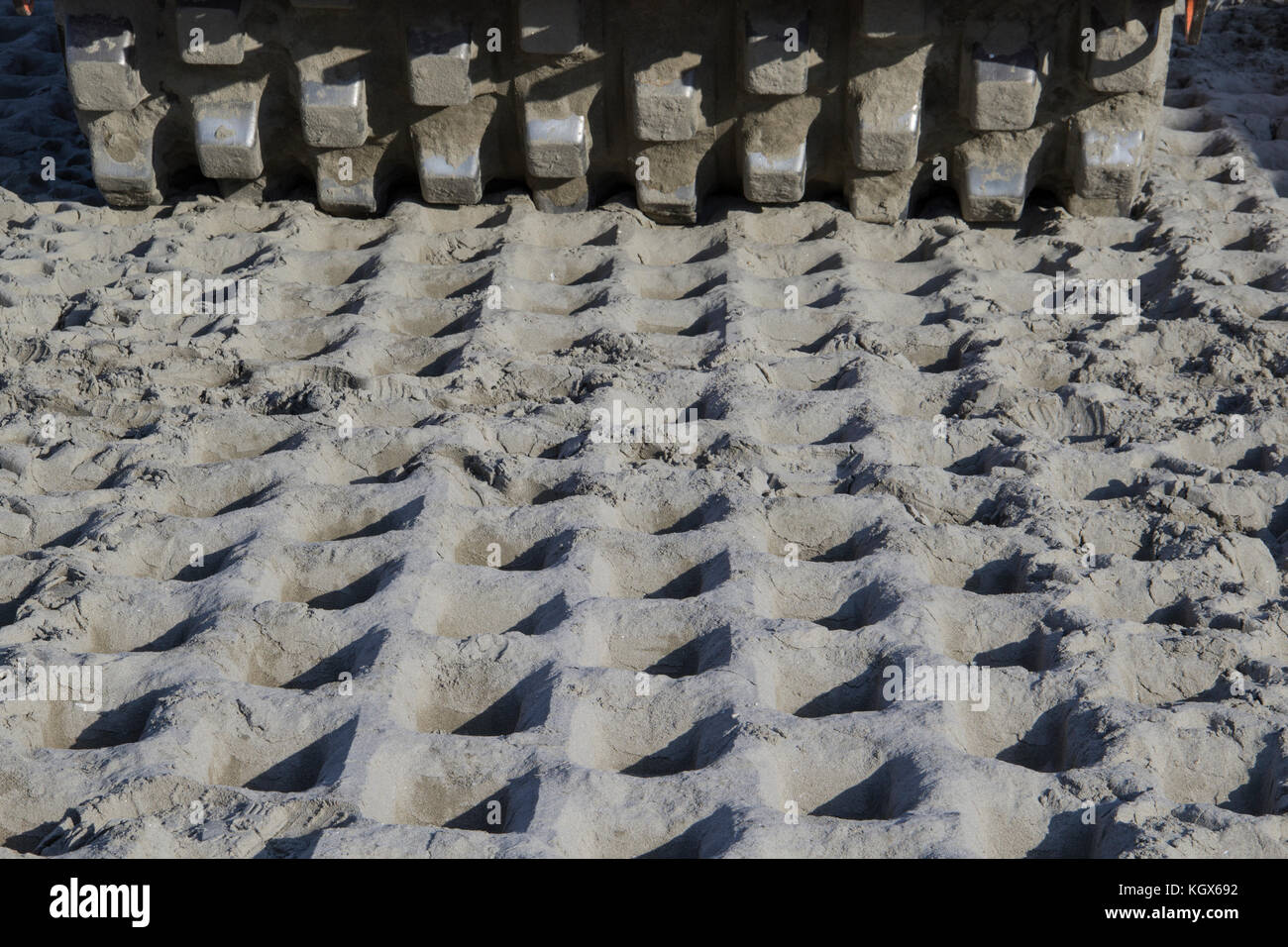 tamped sand on the pad for future construction Stock Photo - Alamy