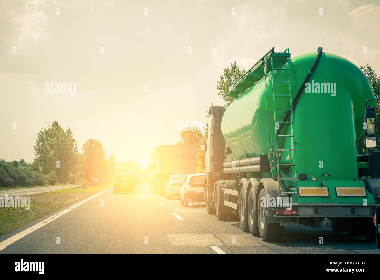 Traffic jam on highway. Waiting Cars Lines. Filtered shot with solar ...
