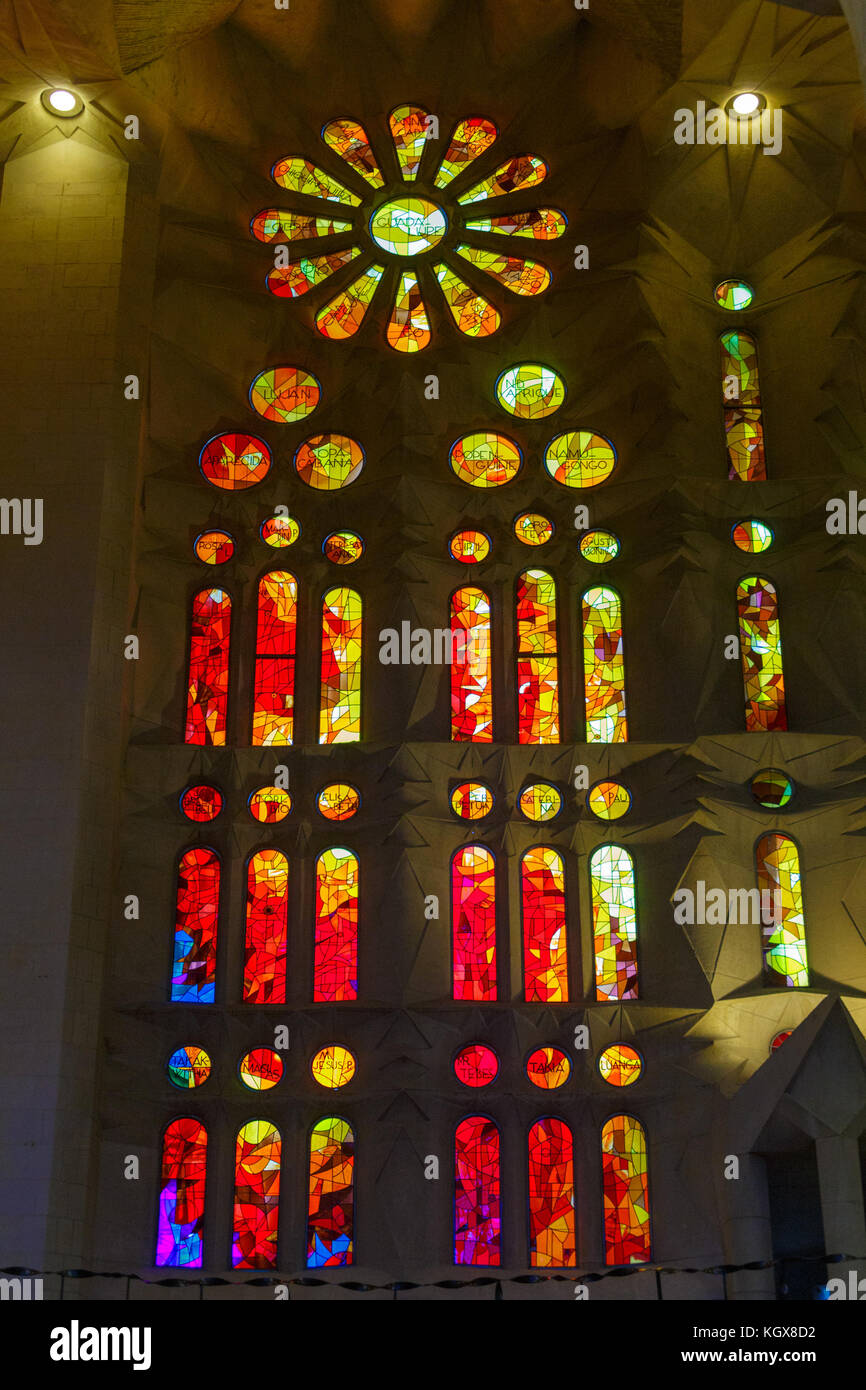 Brightly colored stained glass windows in a dark church Stock Photo - Alamy