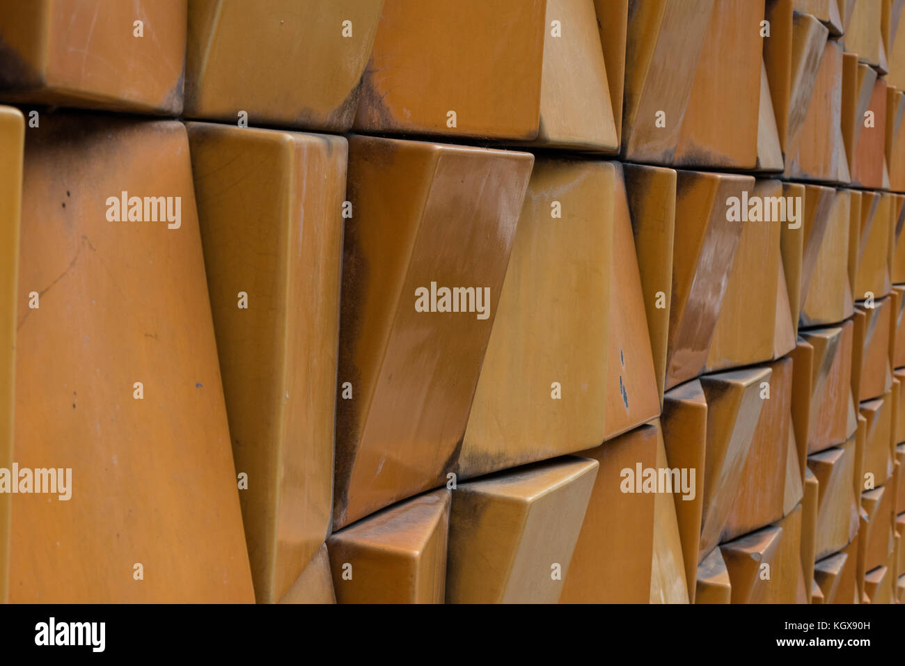 Rows of decorative ornamental bricks in exterior wall in urban city ...