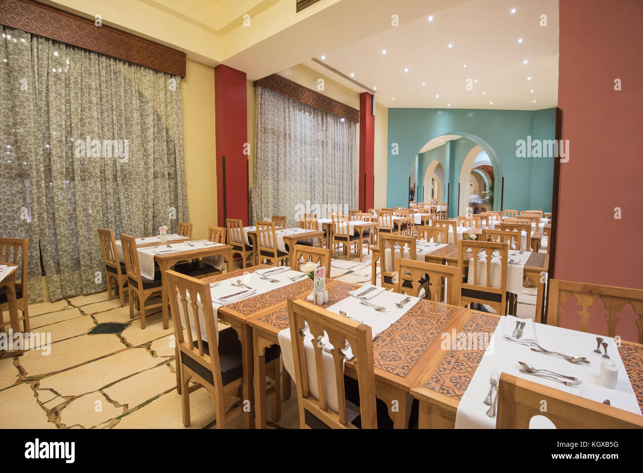 Interior design of a luxury hotel restaurant dining area with ornate ...