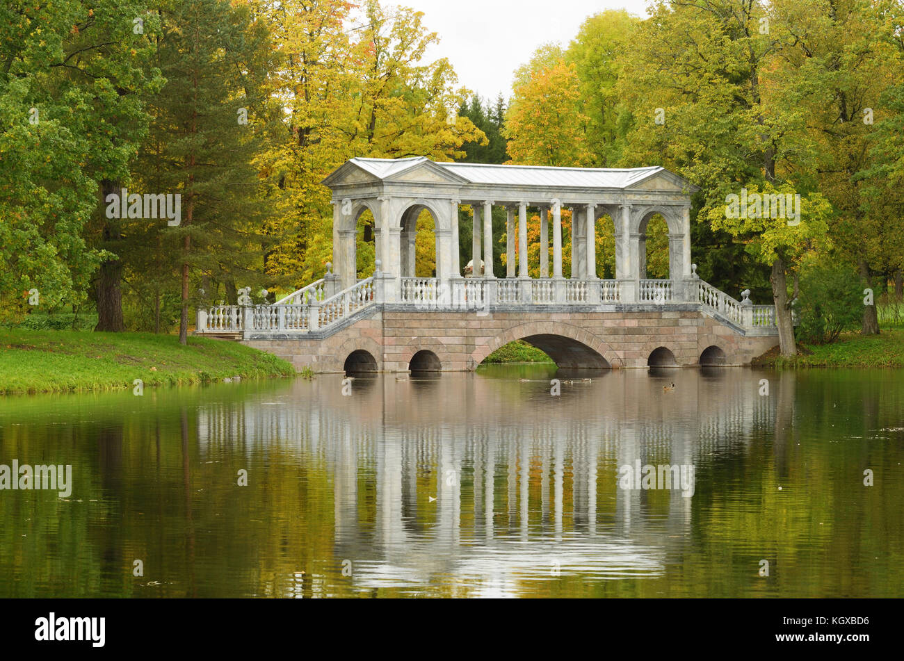 Marble bridge is reflected on the surface of the lake Stock Photo - Alamy