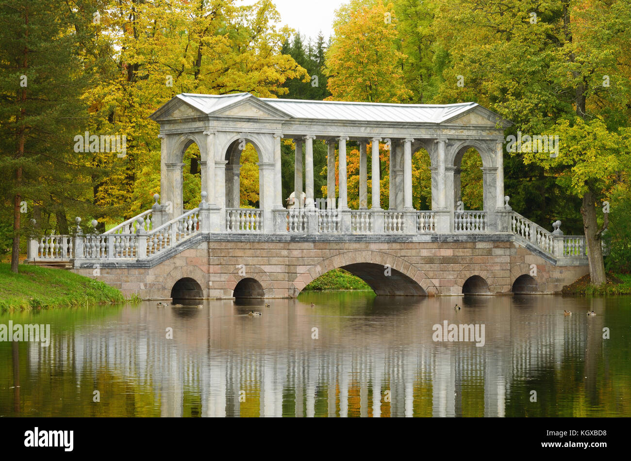 Marble bridge is reflected on the surface of the lake Stock Photo - Alamy