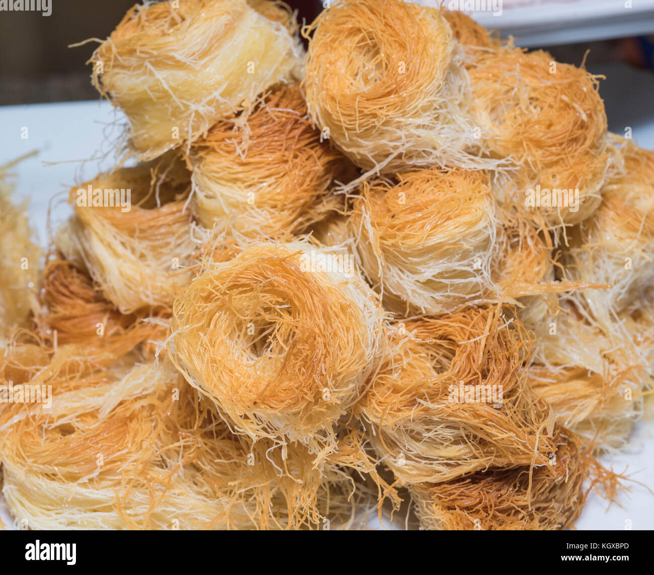 Selection display of sweet oriental pastry food with baklava at a ...