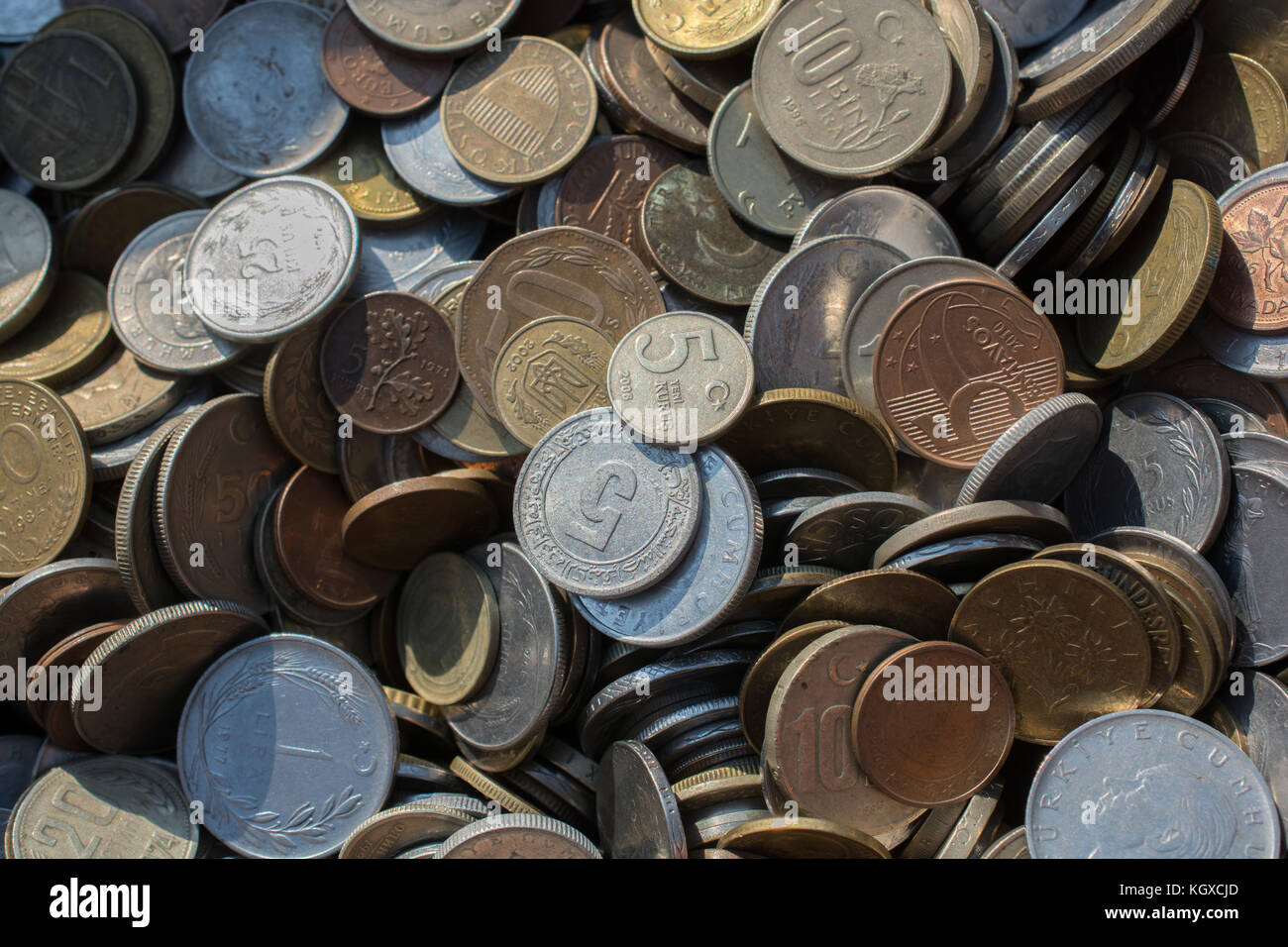 Old metal coin collectiions of various currencies Stock Photo - Alamy