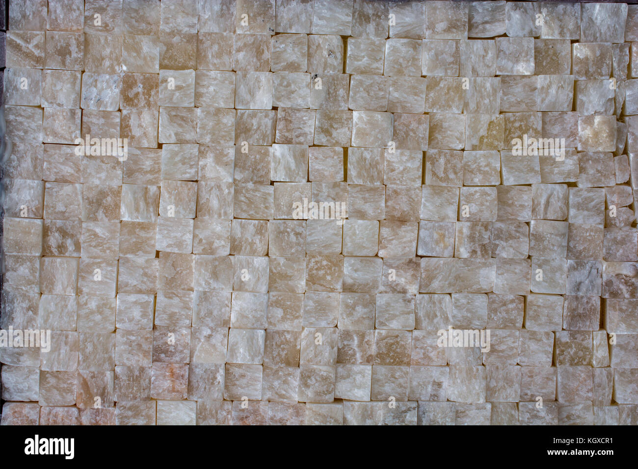 Decorative cubic stone wall as background texture Stock Photo - Alamy