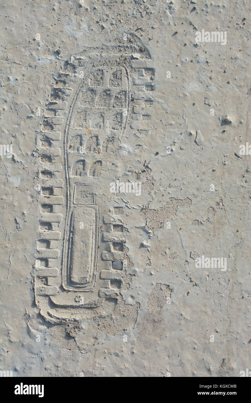 Footstep pattern seen on a concrete background Stock Photo - Alamy