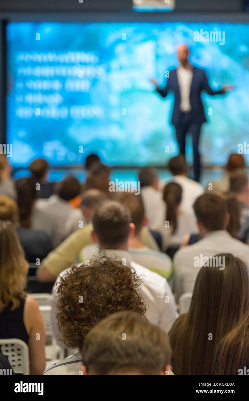 Audience listens to the lecturer Stock Photo - Alamy