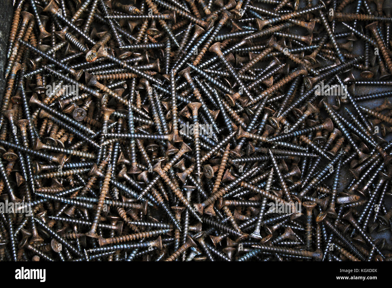 Many old screws rusty Stock Photo - Alamy