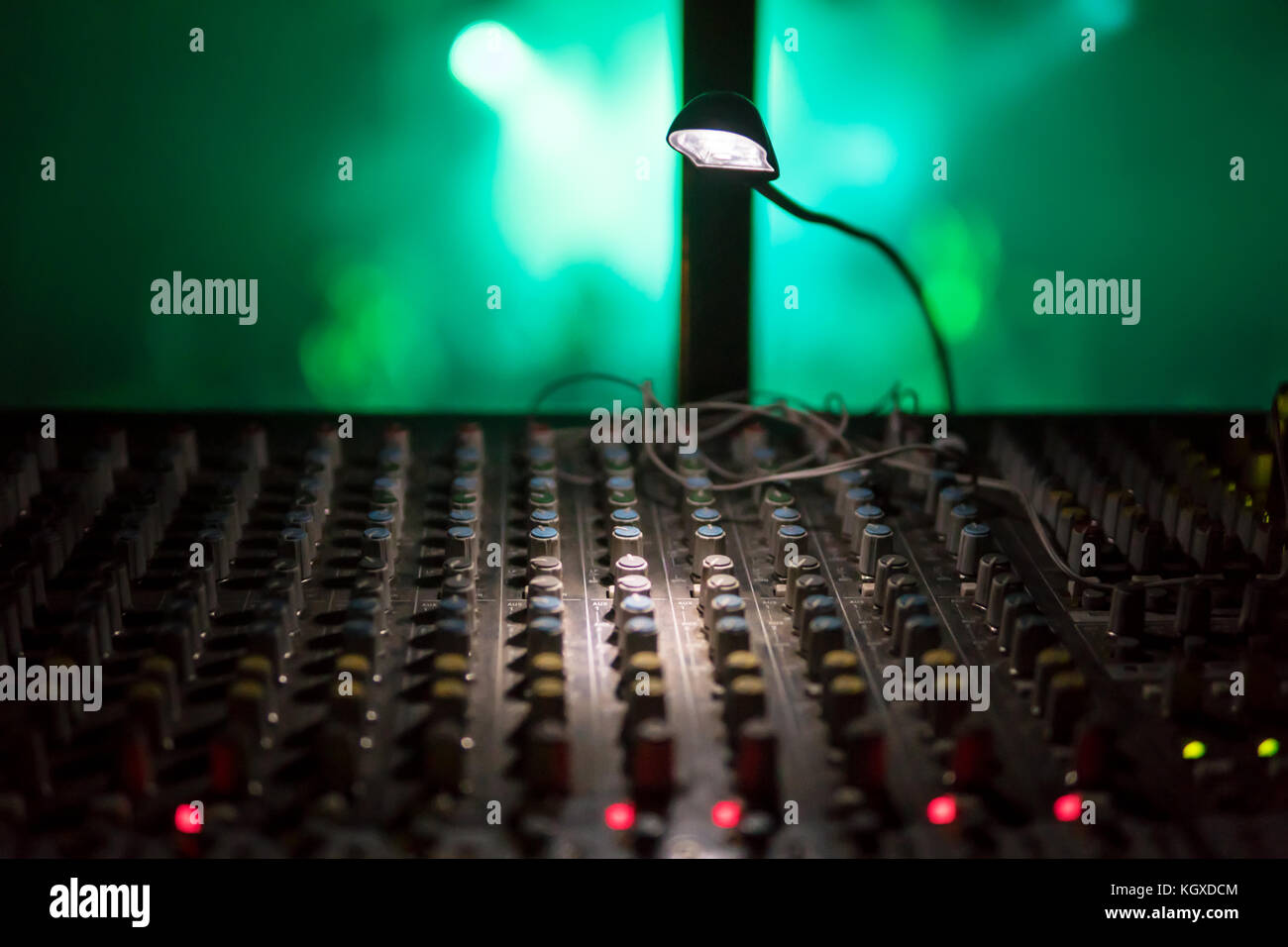 Mixer console with illumination at a concert in the dark Stock Photo ...