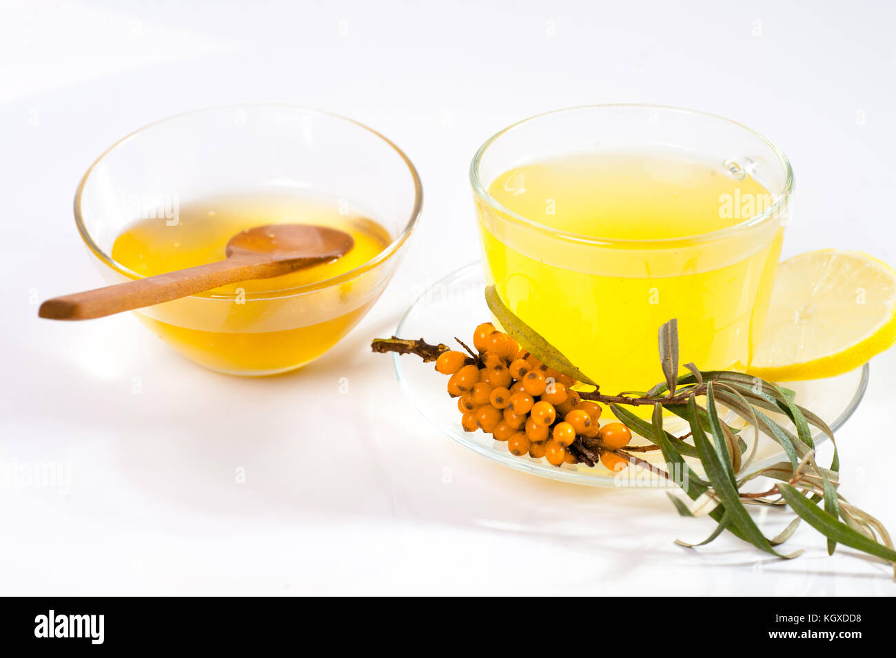 Sea buckthorn tea with a on white background Stock Photo - Alamy