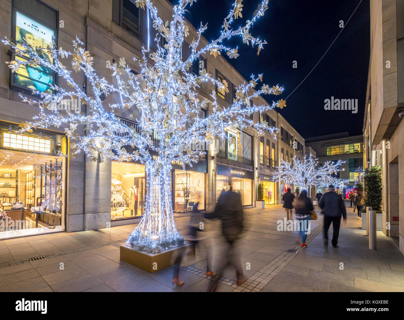 Night view of Multrees Walk upmarket shopping street with Christmas ...