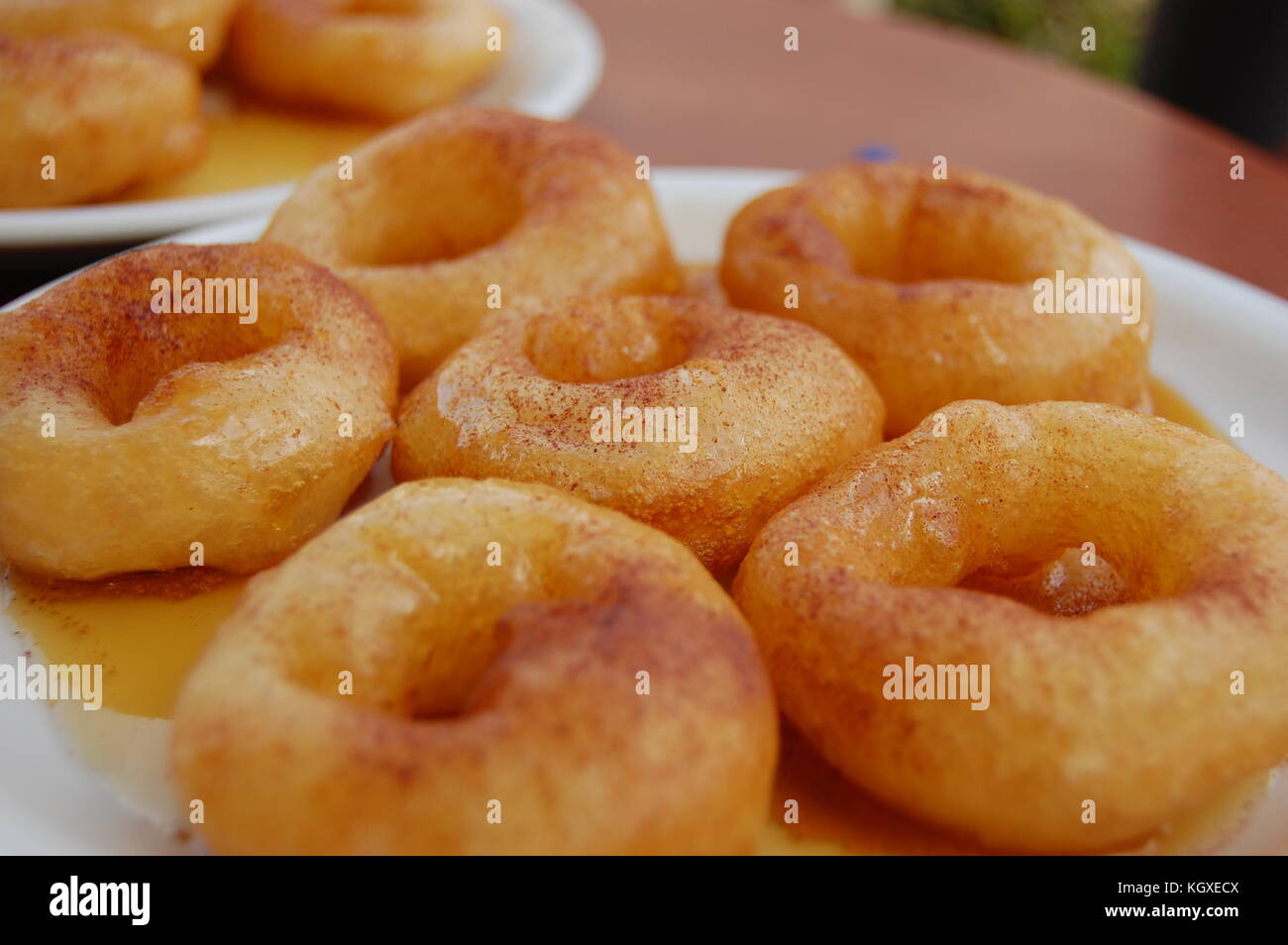 Loukoumades with honey and cinnamon Stock Photo - Alamy