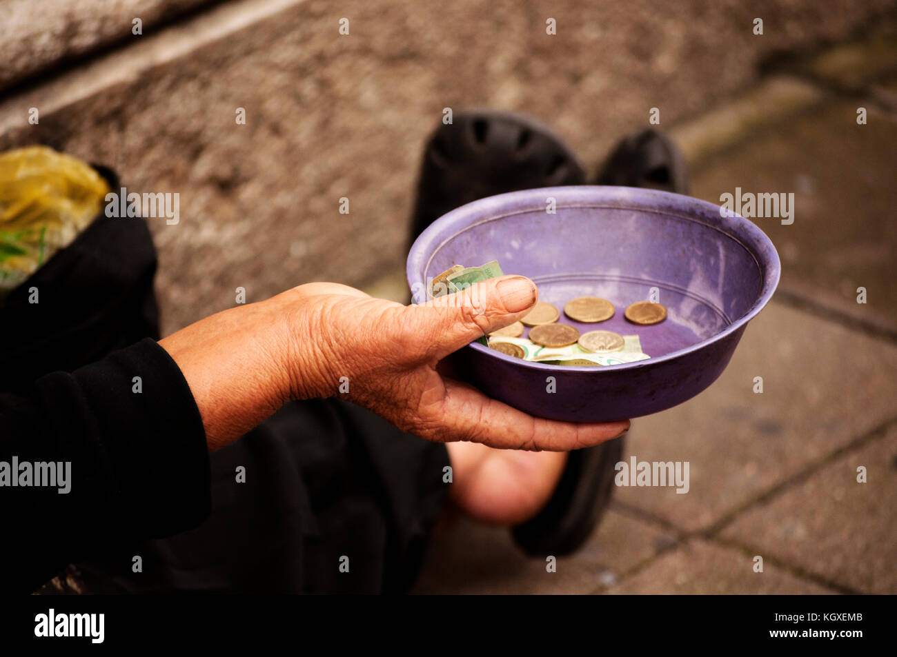 Beggar hand street hi-res stock photography and images - Alamy