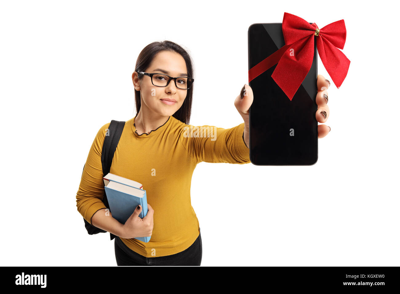 Female teenage student showing a phone wrapped with red ribbon as a ...