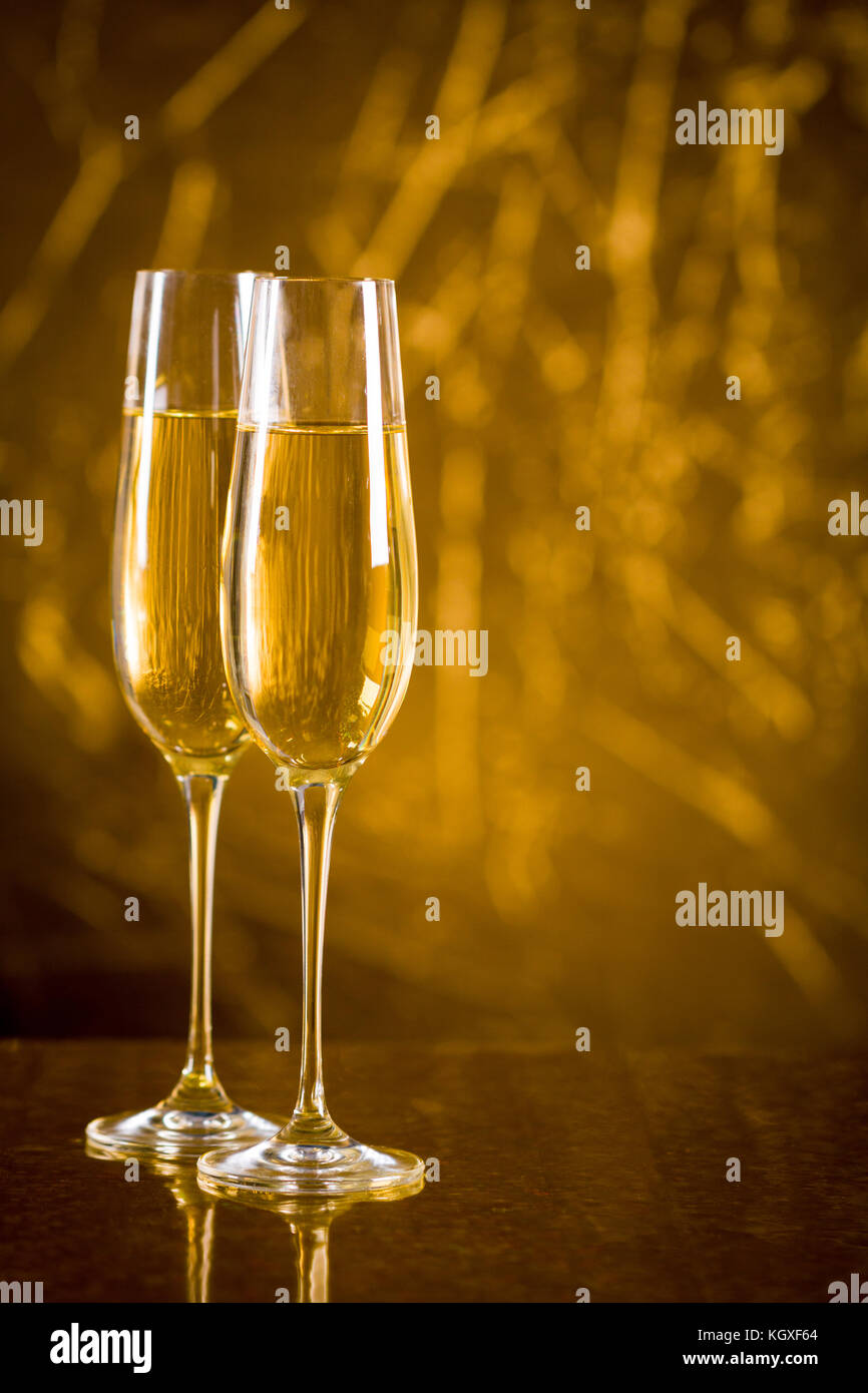 Gold scenery with two glasses of champagne for celebration important ...