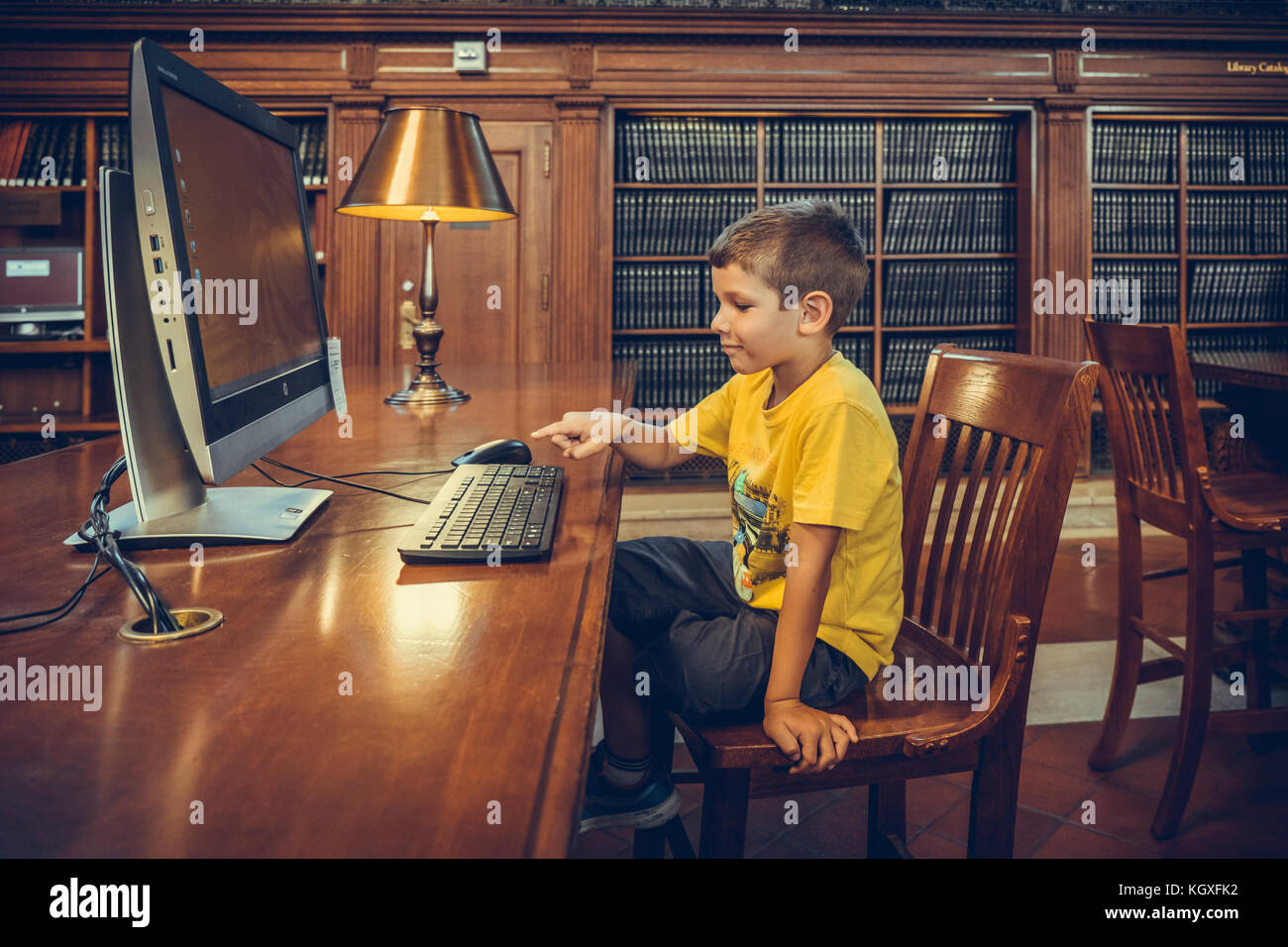 Child uses computer in the suggestive New York Public Library Stock ...