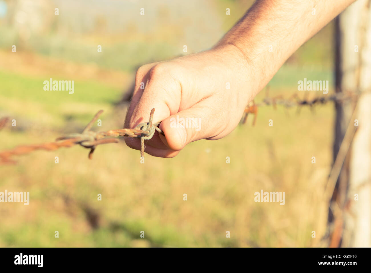 Freedom barbed hand hi-res stock photography and images - Alamy