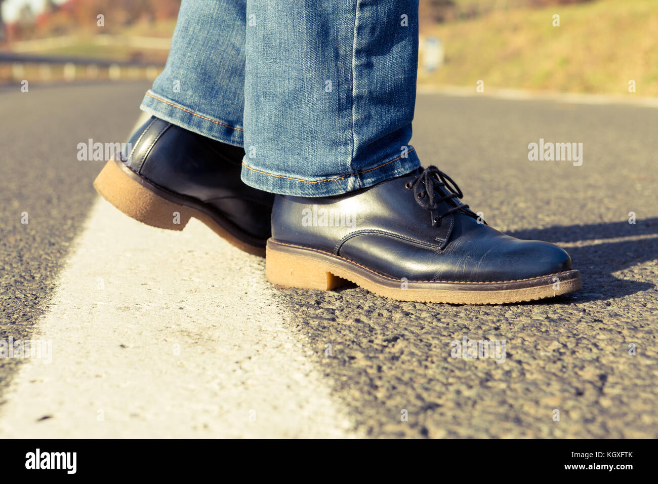 Closeup of woman feet wearing genuine leather autumn shoes standing in ...