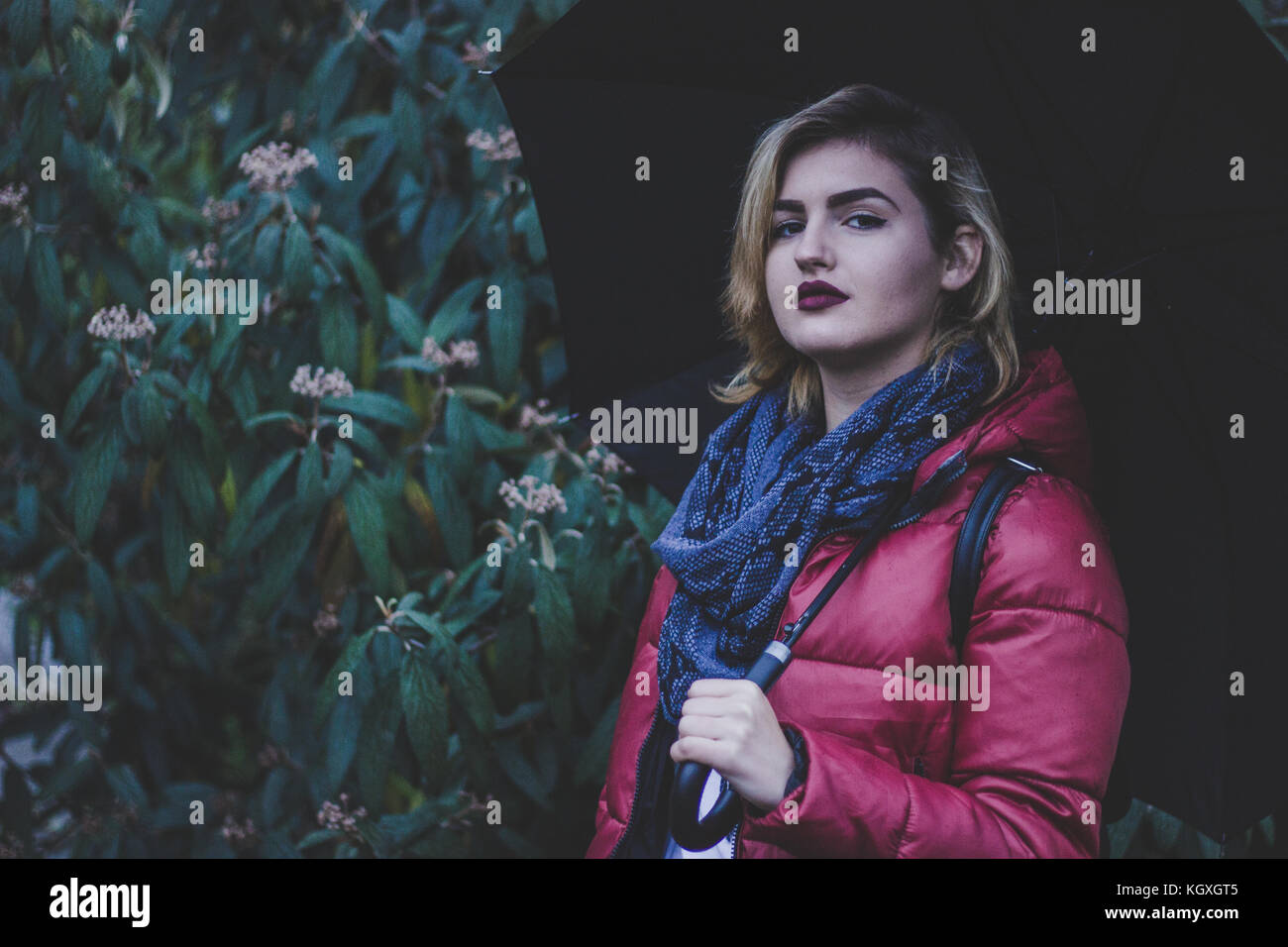 Condescending Girl With Umbrella Stock Photo - Alamy