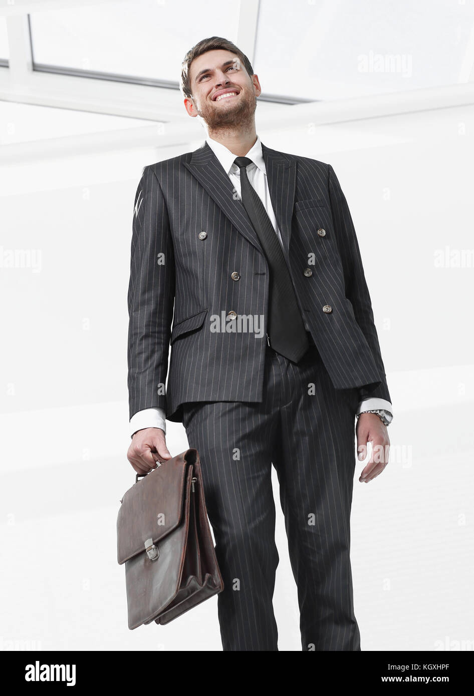 in full growth.portrait of a successful lawyer isolated on white ...