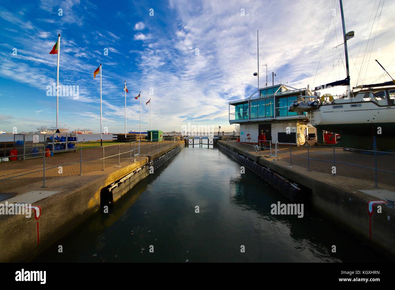 The lock at Shotley Gate marina in Suffolk. Boats leaving the marina ...