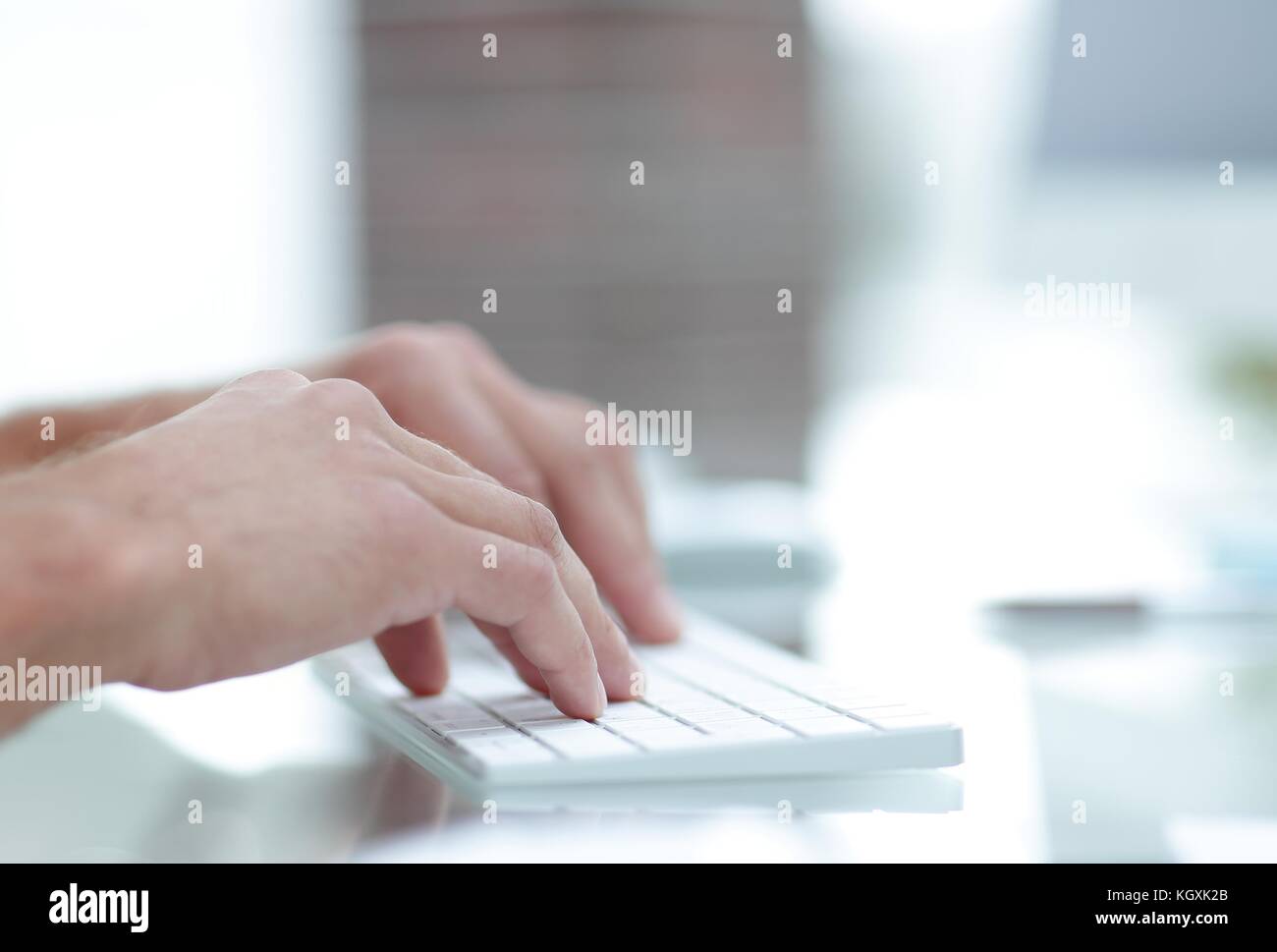close-up of hand typing text on computer keyboard. Business background ...