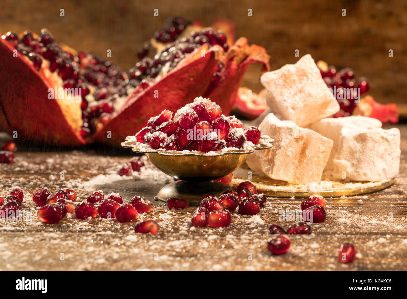 Ripe cracked grenade lies on the vintage dining table in a kitchen ...