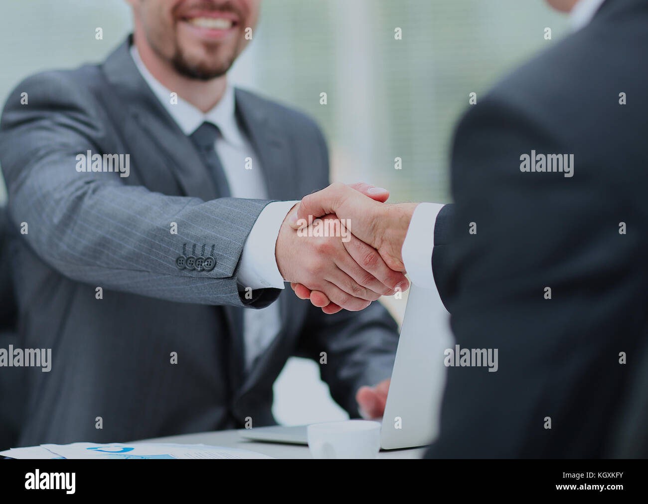 Business handshake of two business man Stock Photo - Alamy