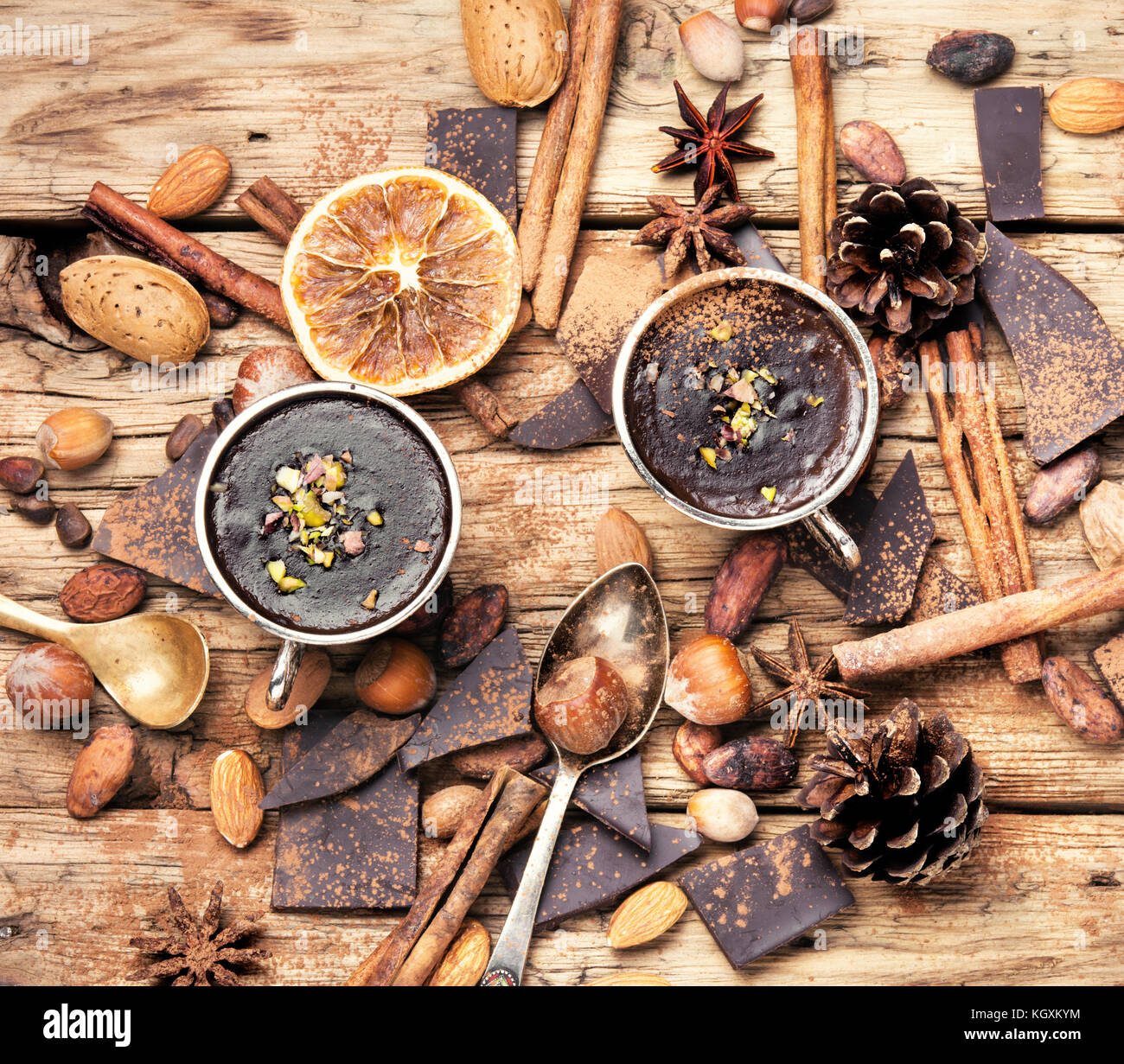 Melted chocolate with spices in stylish metal cups Stock Photo - Alamy