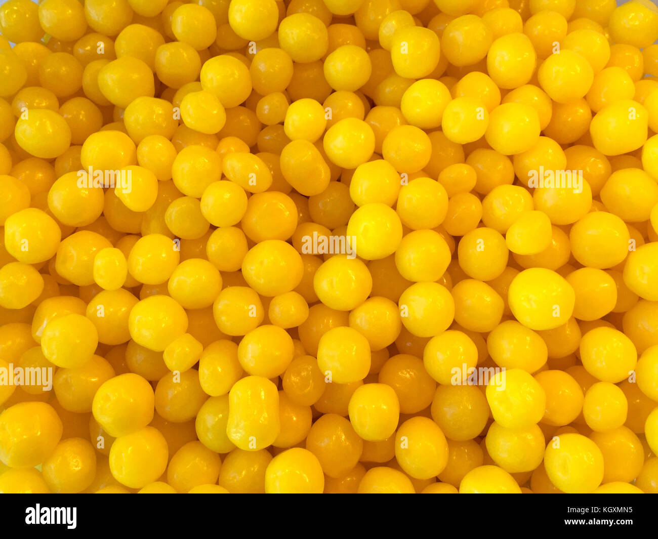 Lemon drop candy hi-res stock photography and images - Alamy