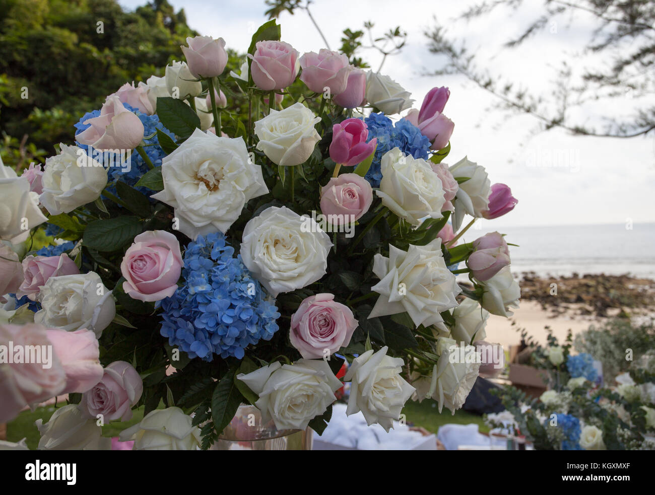 sweet color of roses in wedding event beside the beach Stock Photo - Alamy