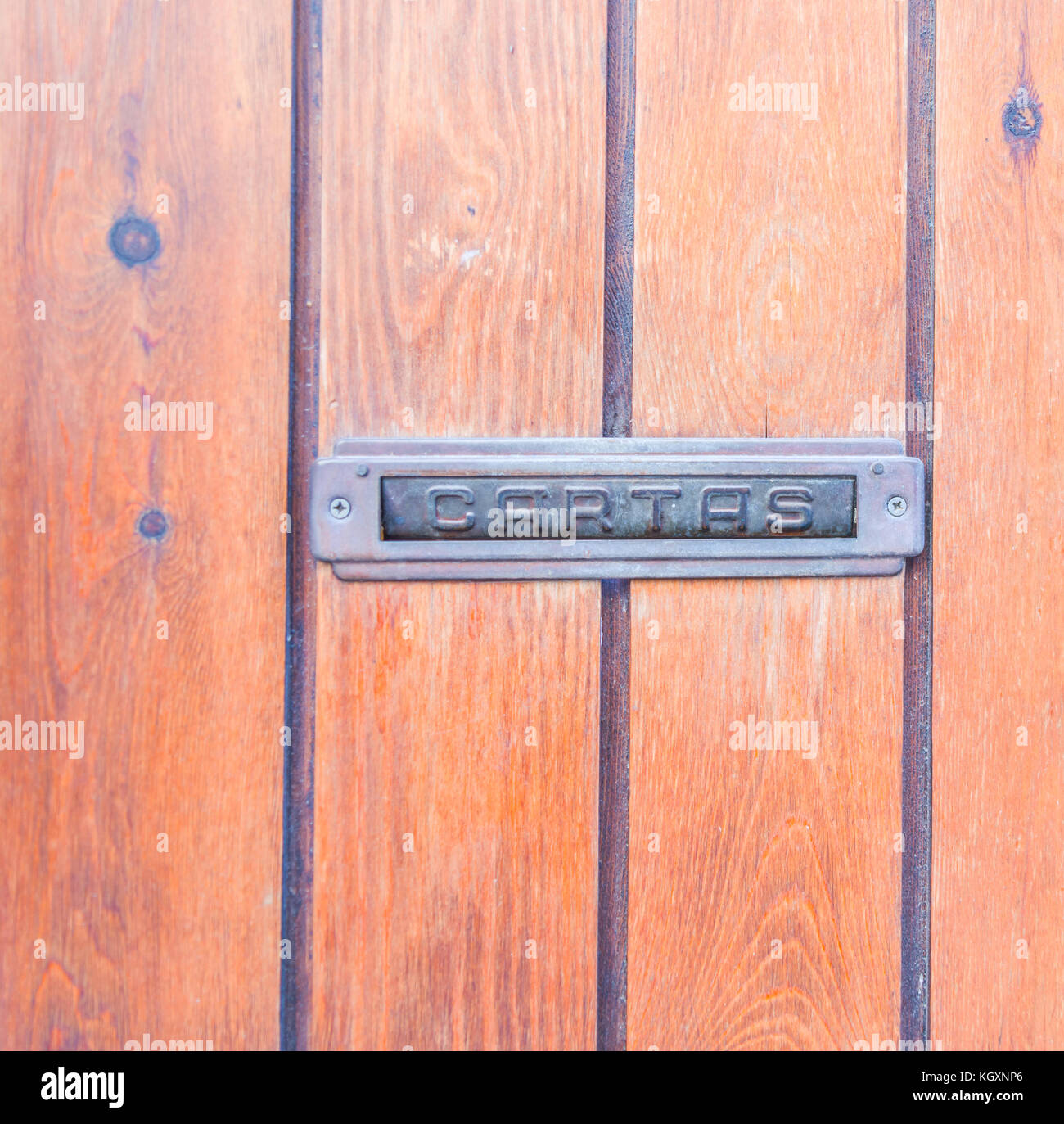 Old letterbox in the door, traditional way of delivering letters to the ...
