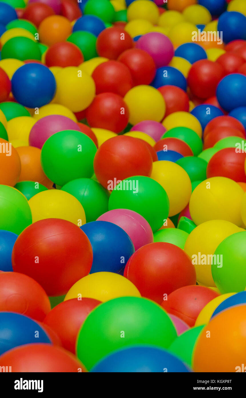 multi-colored balls on the playground vertical Stock Photo - Alamy