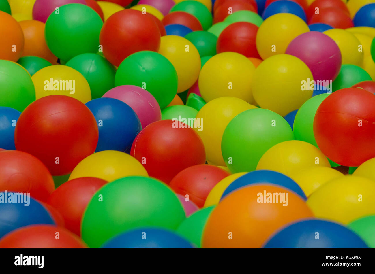 multi-colored balls on the playground horozontal Stock Photo - Alamy