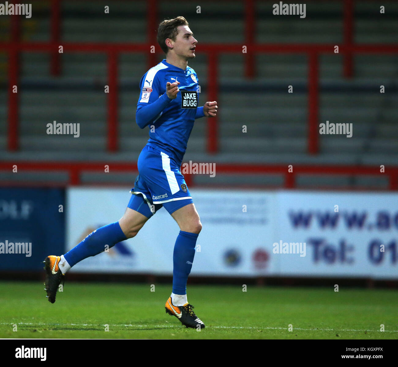 Notts County's Elliott Hewitt celebrates scoring his side's first goal ...