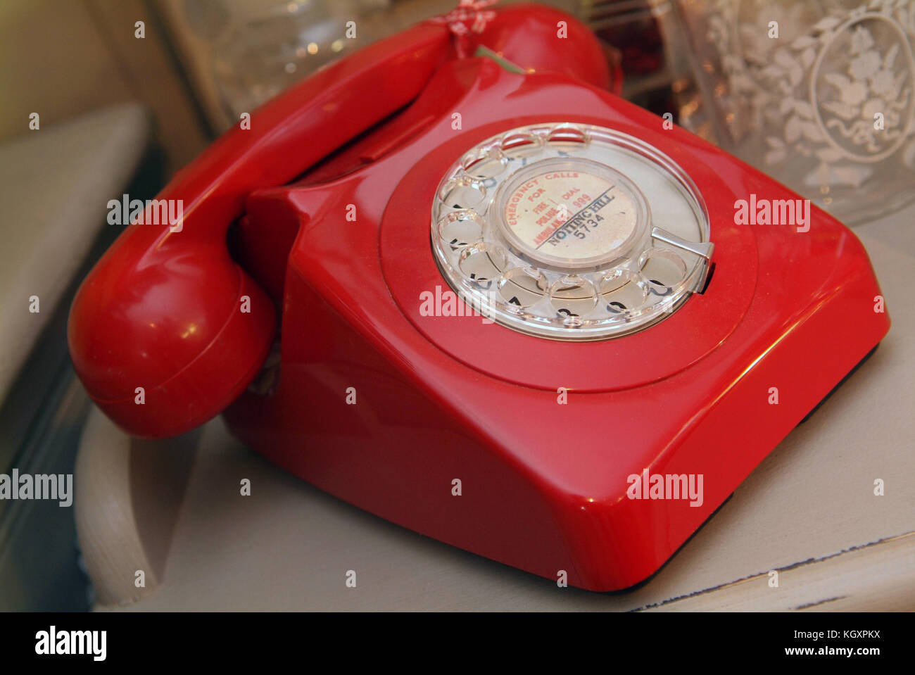 Red plastic telephone Stock Photo - Alamy