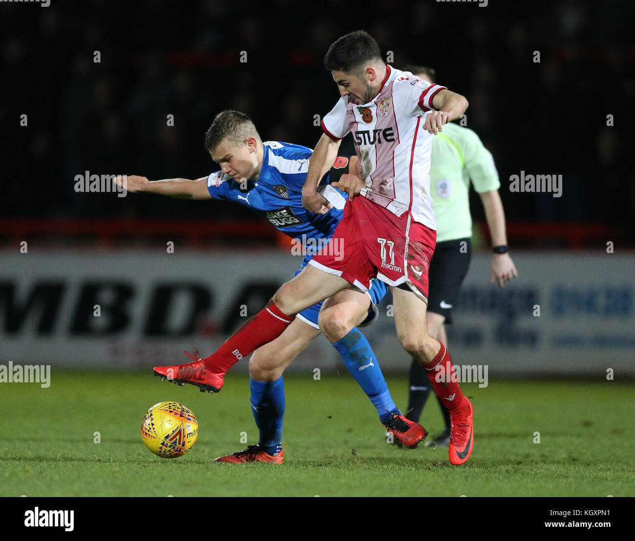 Stevenage's Tom Pett (right) and Notts County's Ryan Yates battle for ...