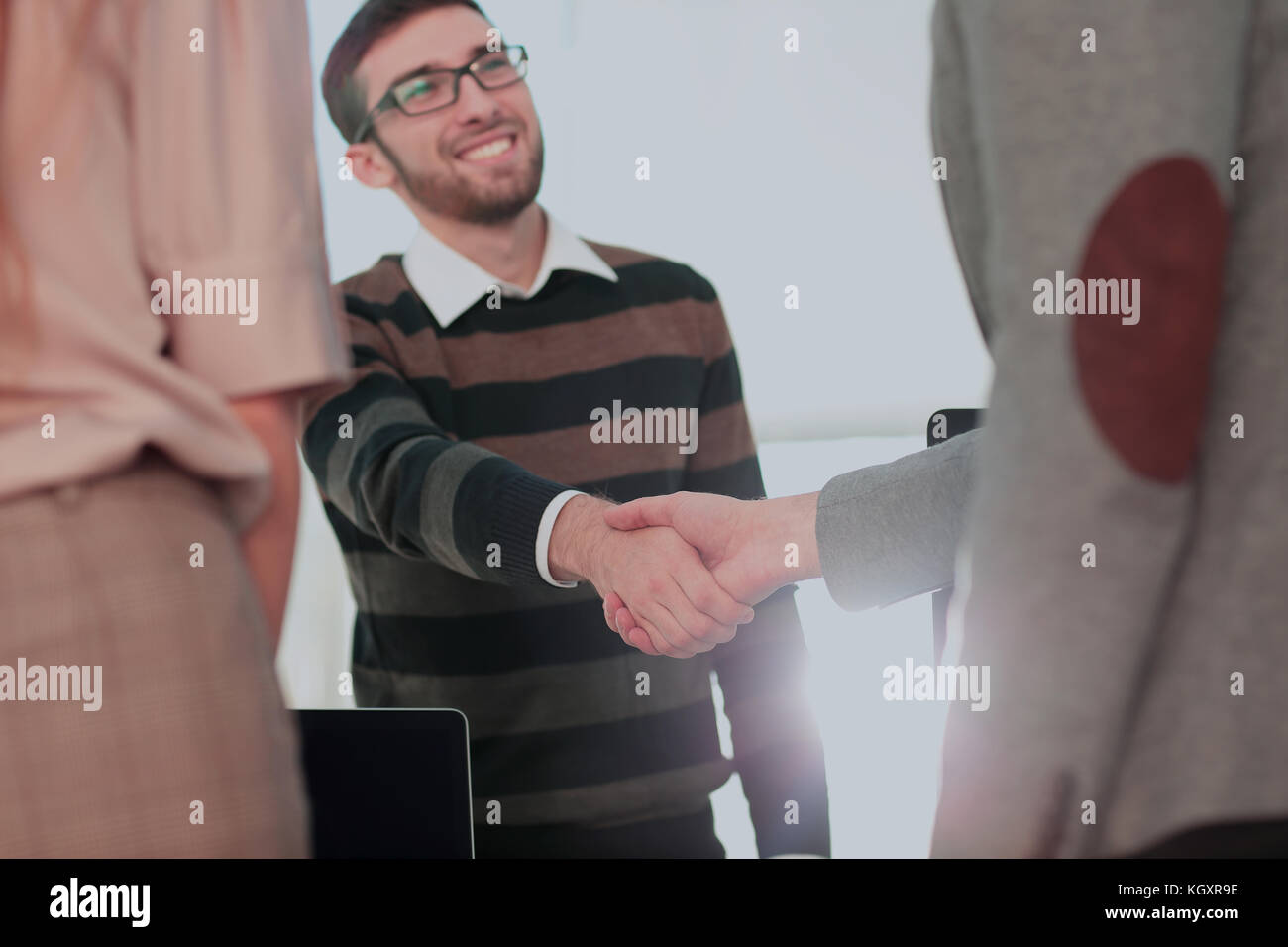 Business people closing a deal and handshaking at the office Stock ...