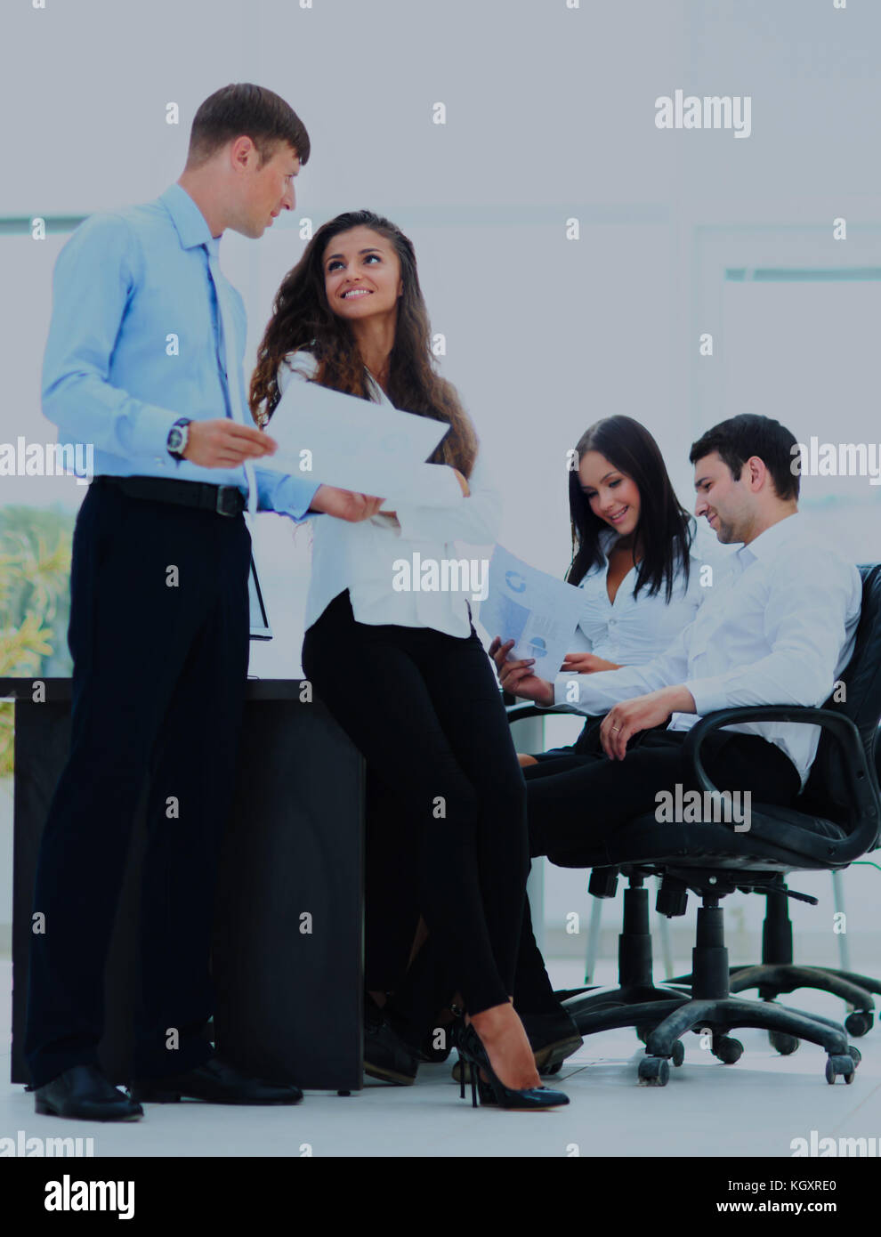 Business - meeting in office, two managers are discussing a docu Stock ...