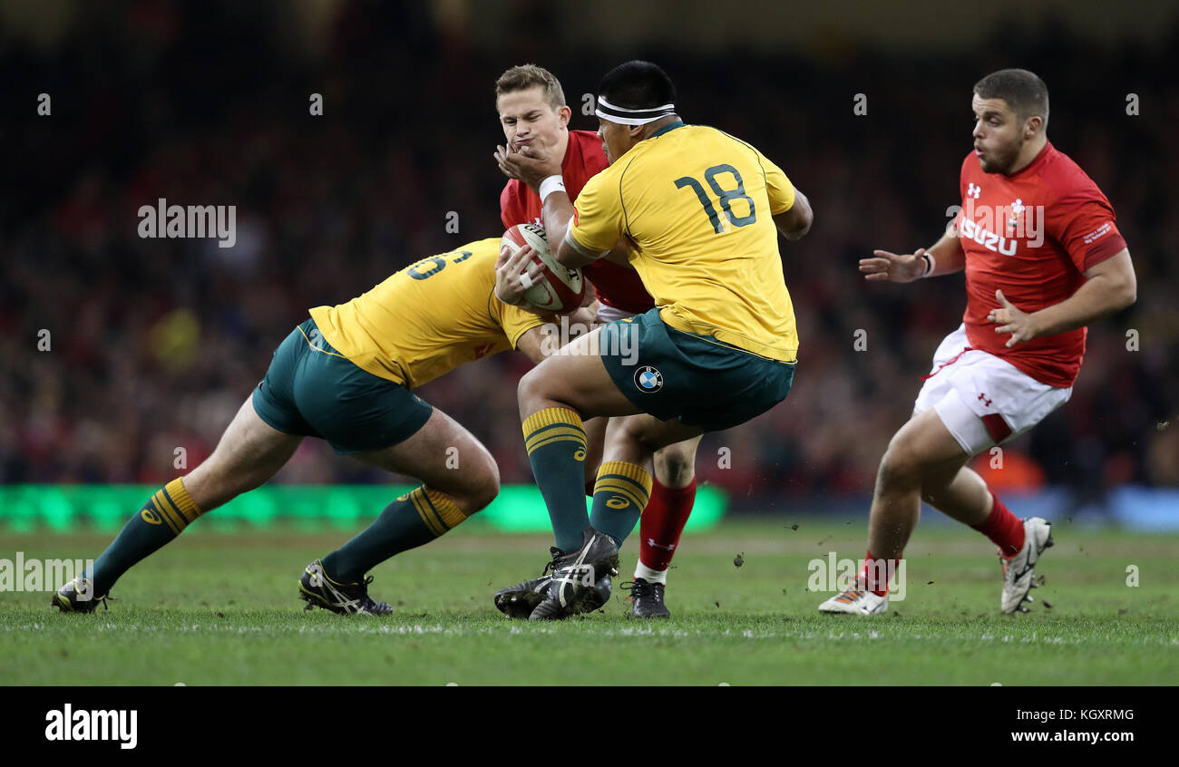 Wales' Hallam Amos ia tackled by Australia's Stephen Moore and Allan ...