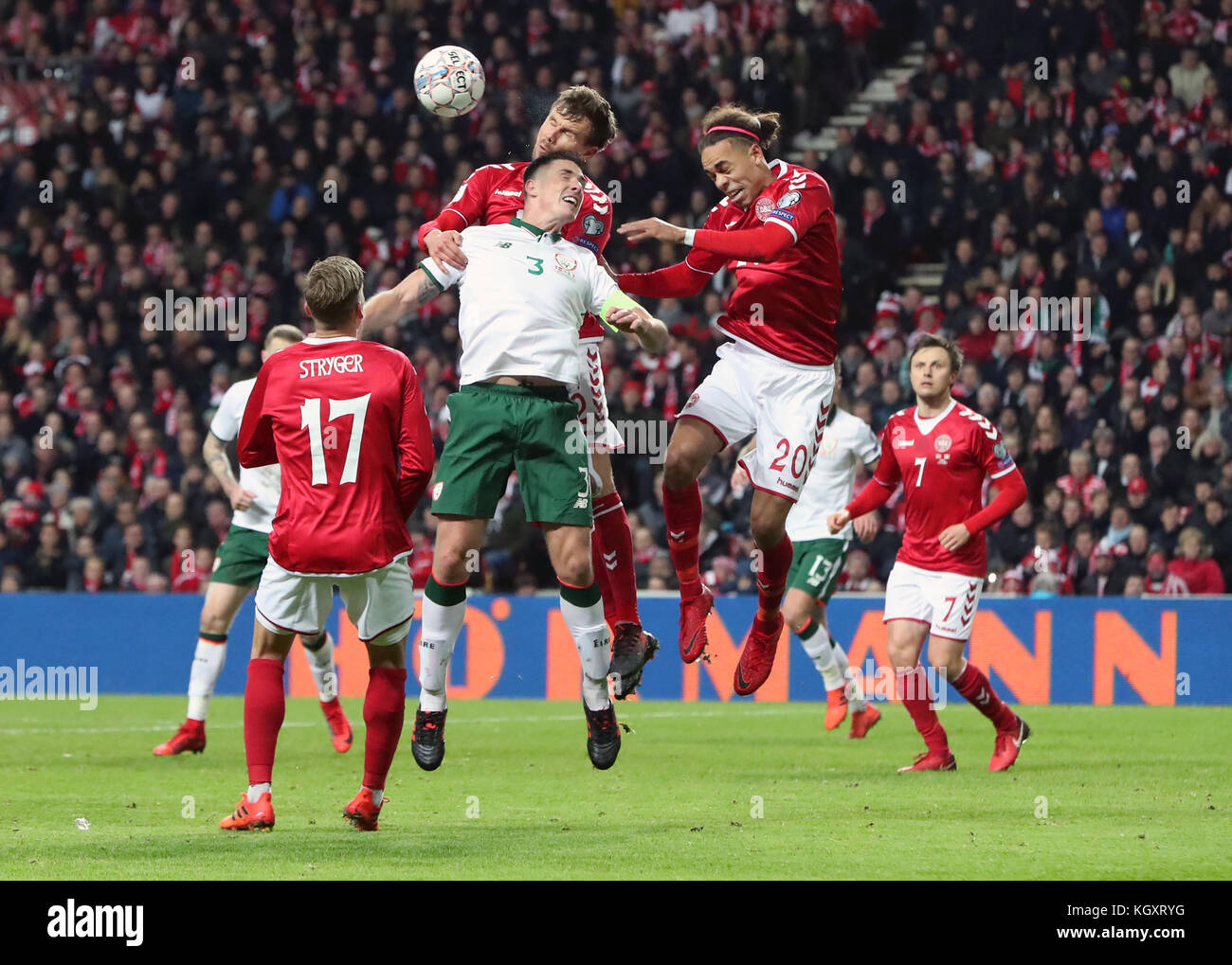 Denmark's Andreas Bjelland and Yussuf Poulsen combine to challenge ...