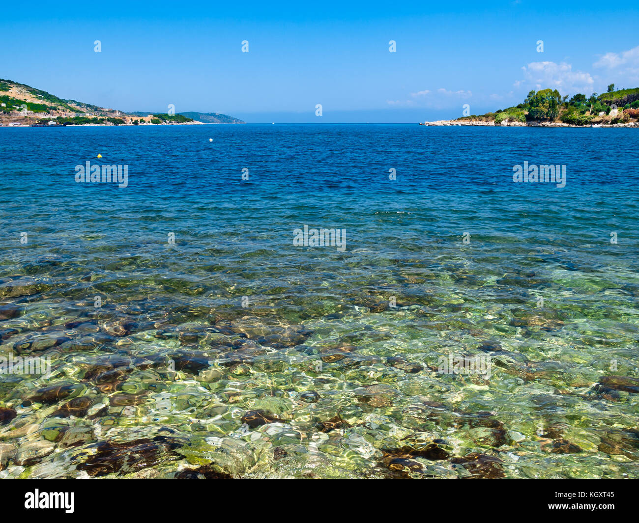 View of the sea bay with crystal clear water. Corfu, Greece Stock Photo ...