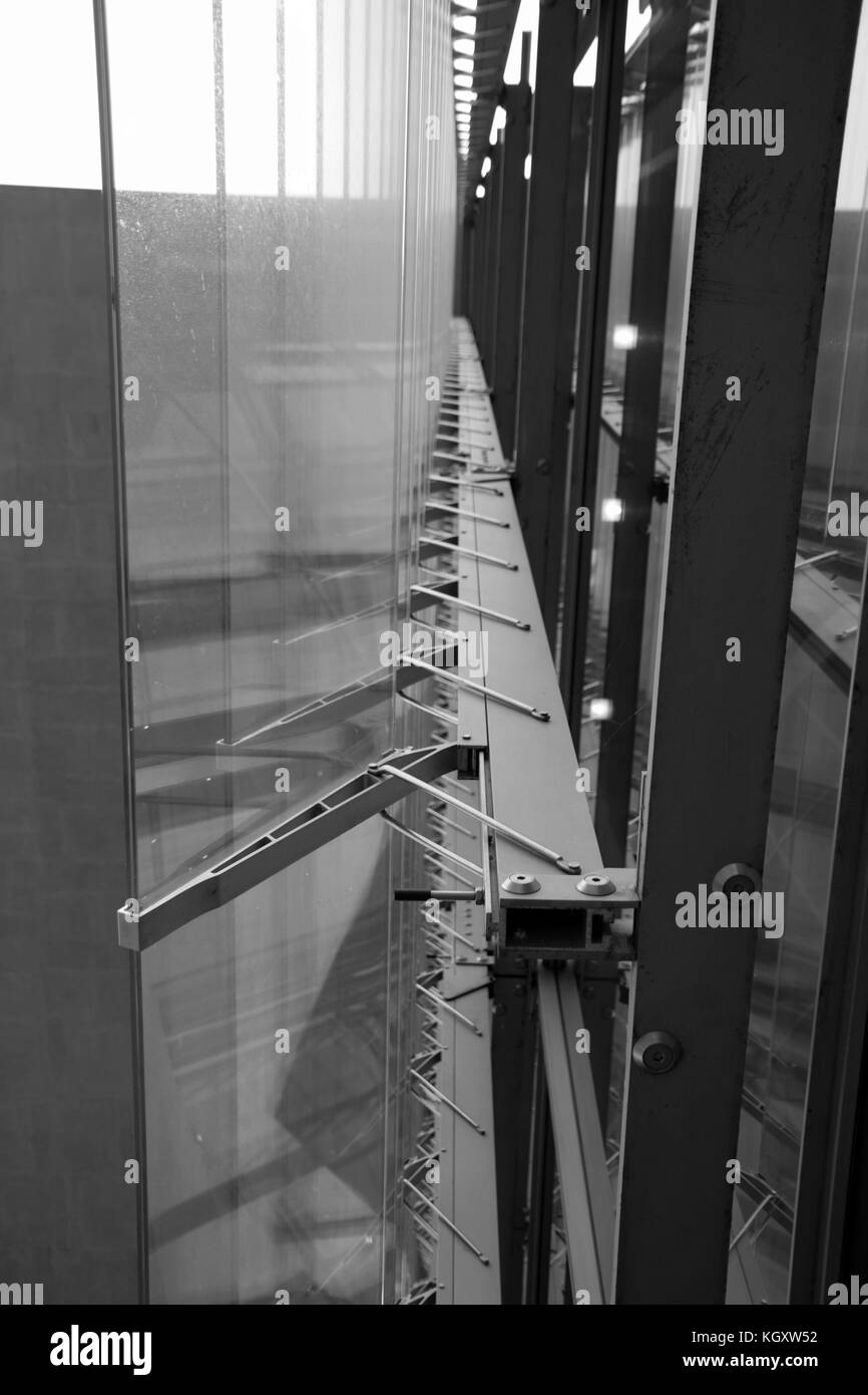 unusual glass and steel as a privacy Screen on a house facade Stock ...